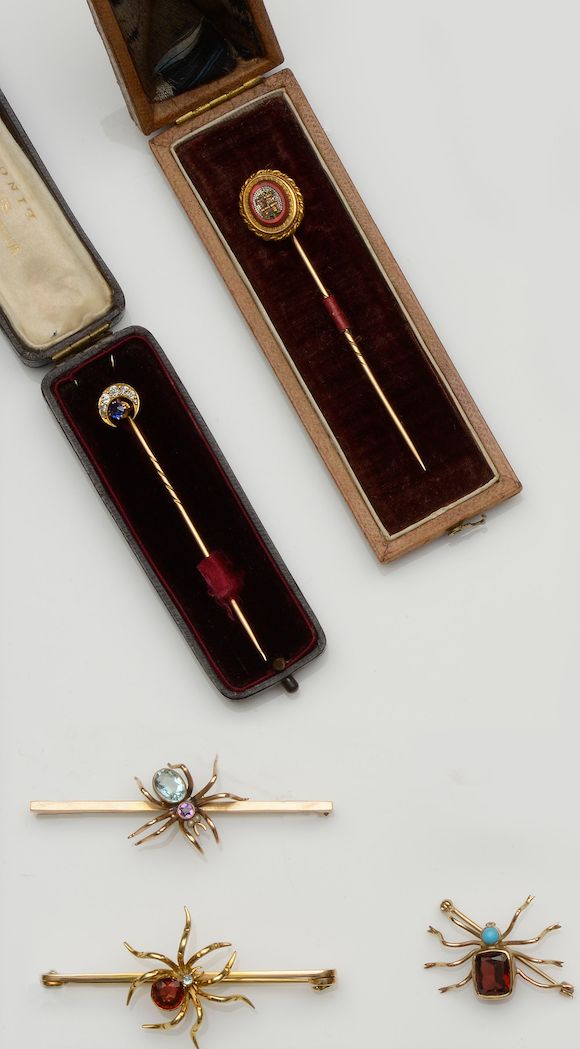Bonhams : A collection of vari gem-set stickpins and bar brooches (5)