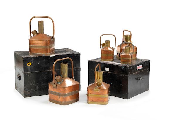 Bonhams : A boxed set of six copper and brass petrol measures, circa ...