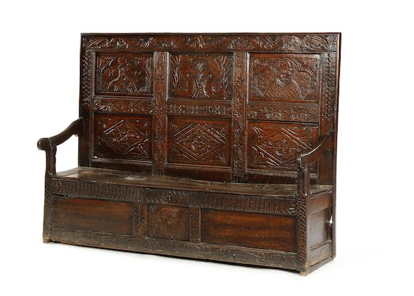 Bonhams : An oak high-back box settle Incorporating 17th century timbers
