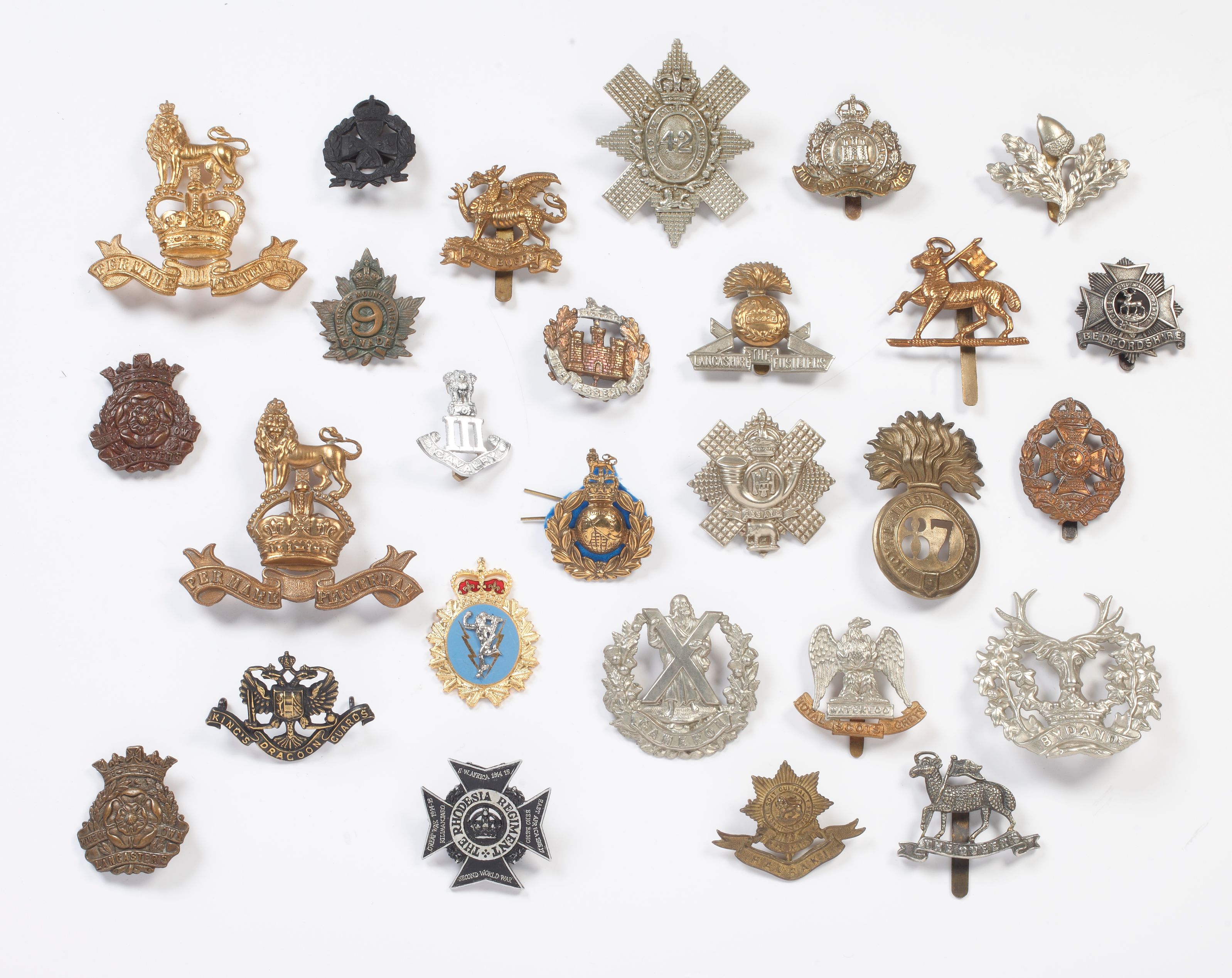 Bonhams : British Military Reproduction Cap Badges.