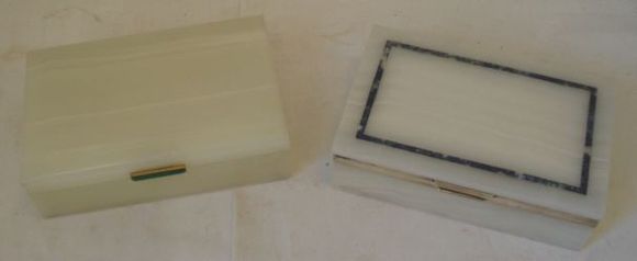 Bonhams : A polished alabaster and lapiz line inlaid cigarette box,with ...