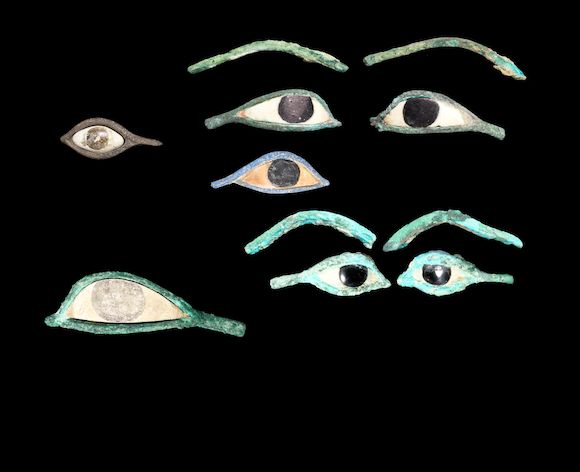 Bonhams : Two pairs of Egyptian bronze eye inlays and three other ...