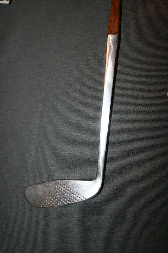 Bonhams : An Oke style putter with a 7½ inch thin square hosel circa 1920s