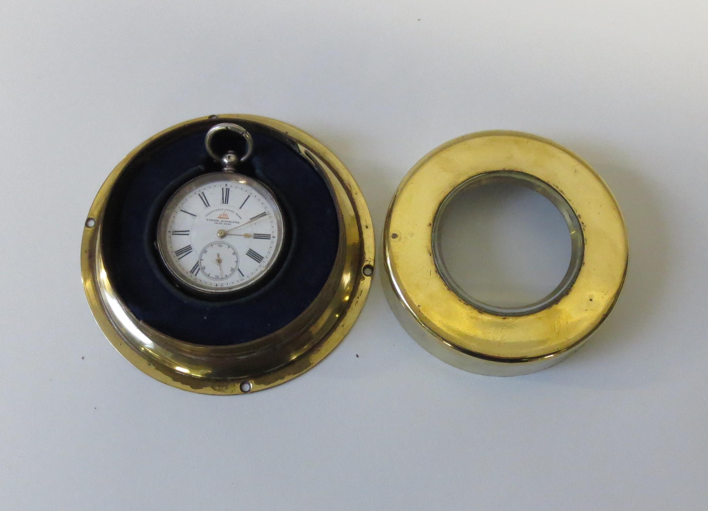 Bonhams Cars : A silver cased pocket watch with brass dashboard mount,