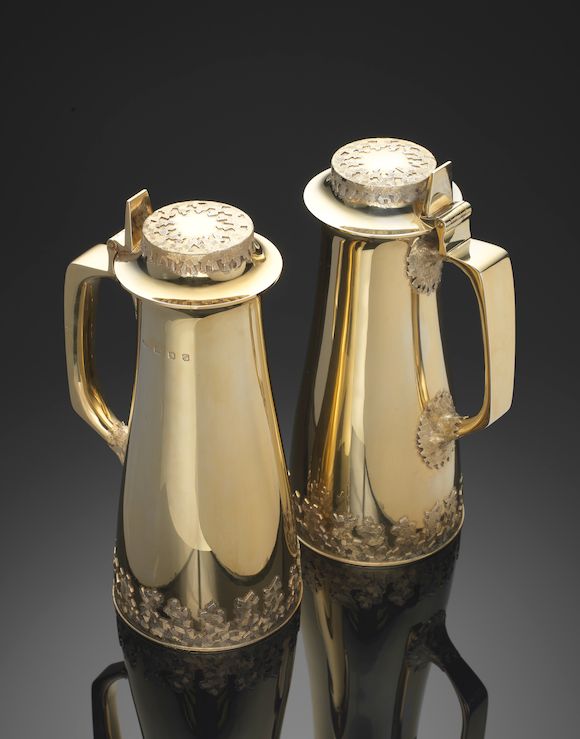 Bonhams : CHRISTOPHER NIGEL LAWRENCE: A rare pair of silver-gilt ewers ...