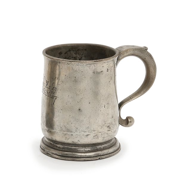 Bonhams : An ale-pint U-shaped mug, circa 1730