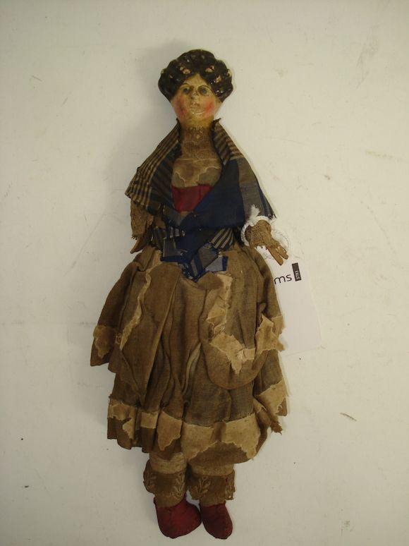 Bonhams : Small papier-mache shoulder head doll, circa 1840