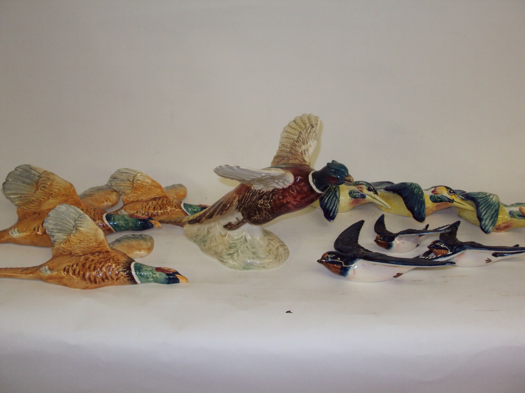 Bonhams : Three sets of Beswick bird wall plaques, and a Beswick pheasant