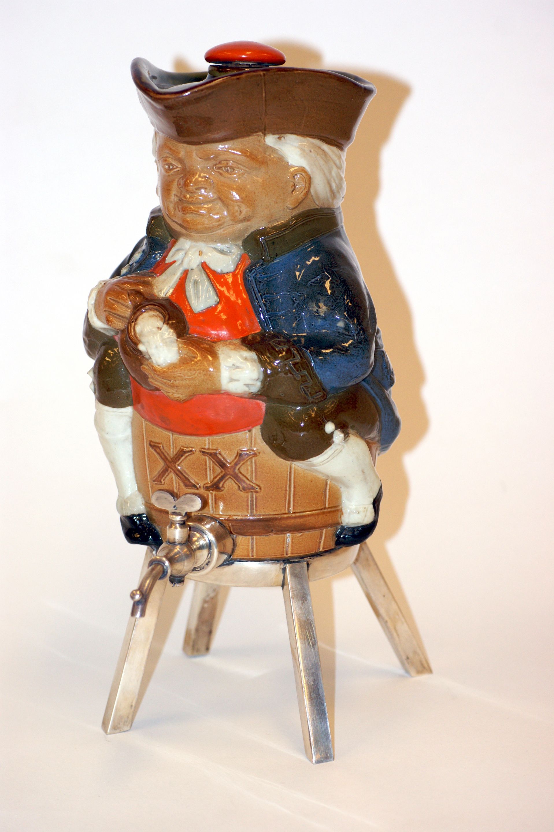 Bonhams : A Royal Doulton Lambeth coloured salt glazed Toby jug spirit ...