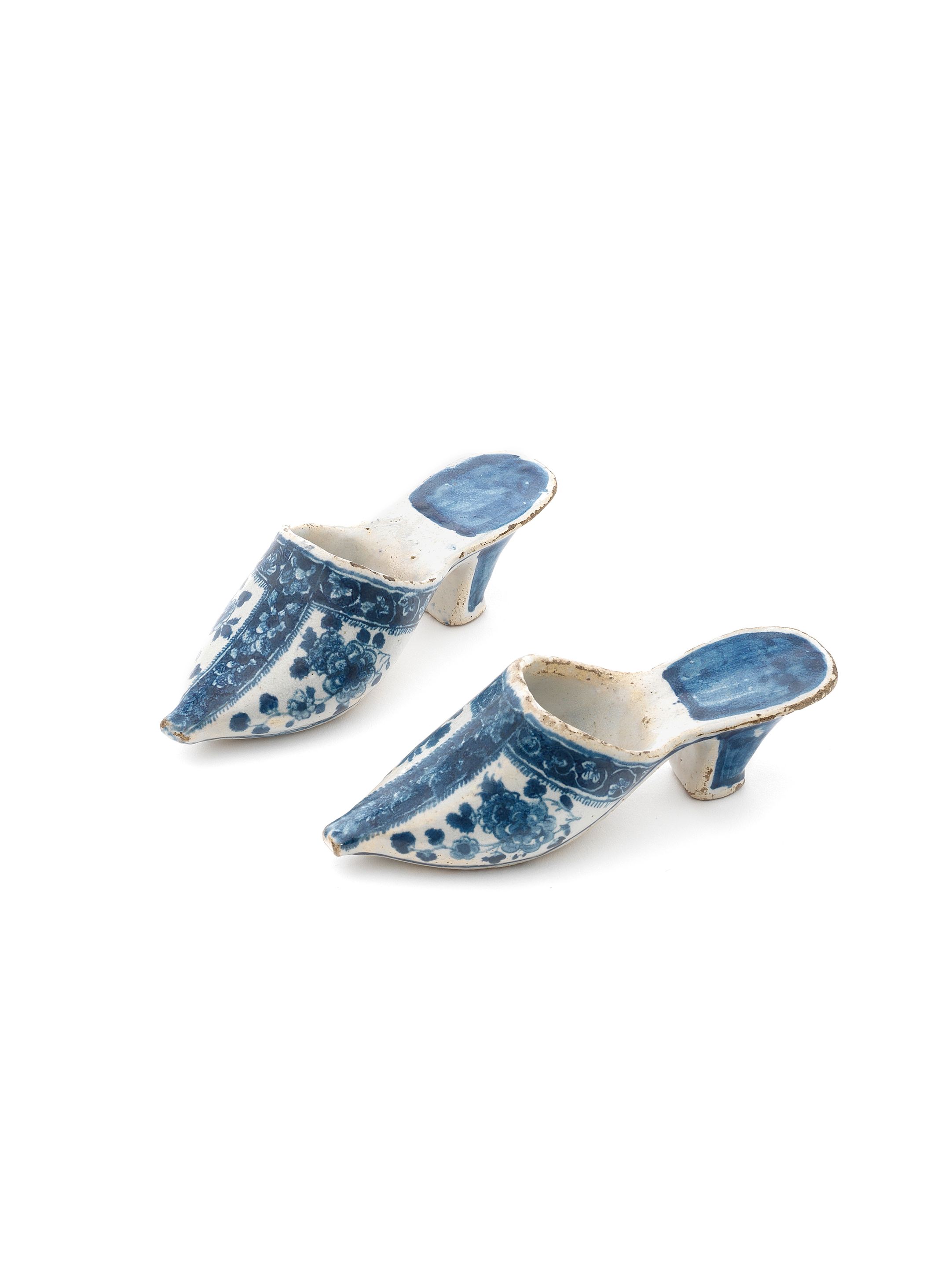 Bonhams : A pair of Dutch Delft slippers, mid 18th century