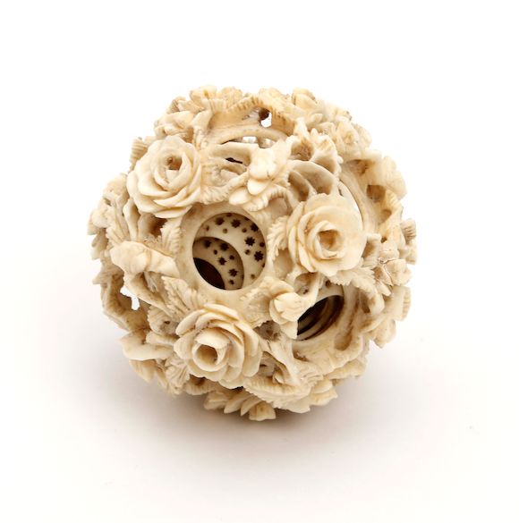 Bonhams : A Chinese carved ivory puzzle ball Circa 1890-1910