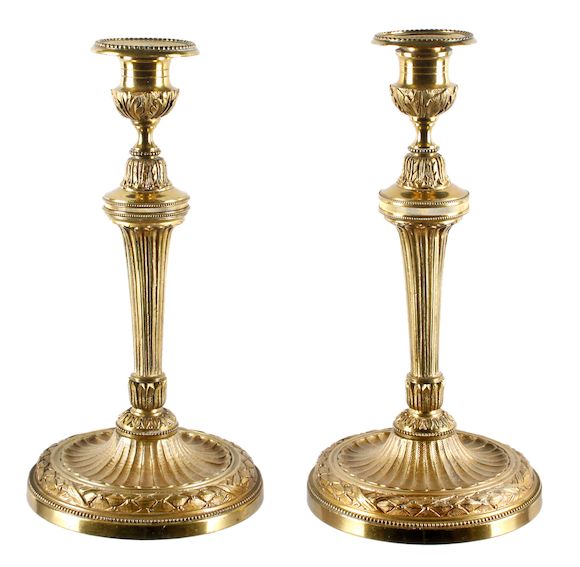 Bonhams : A pair of 19th Century French gilt candlesticks
