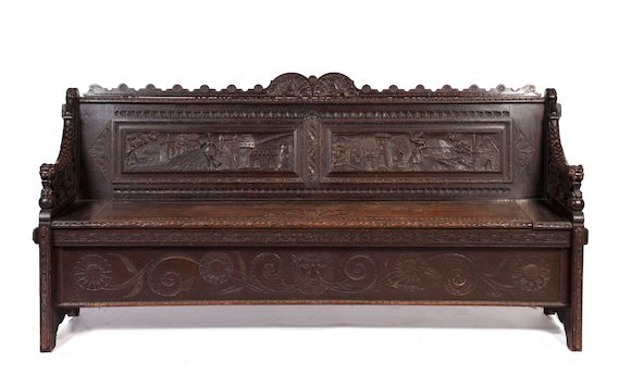 Bonhams : A 19th century Flemish carved oak hall box settle,