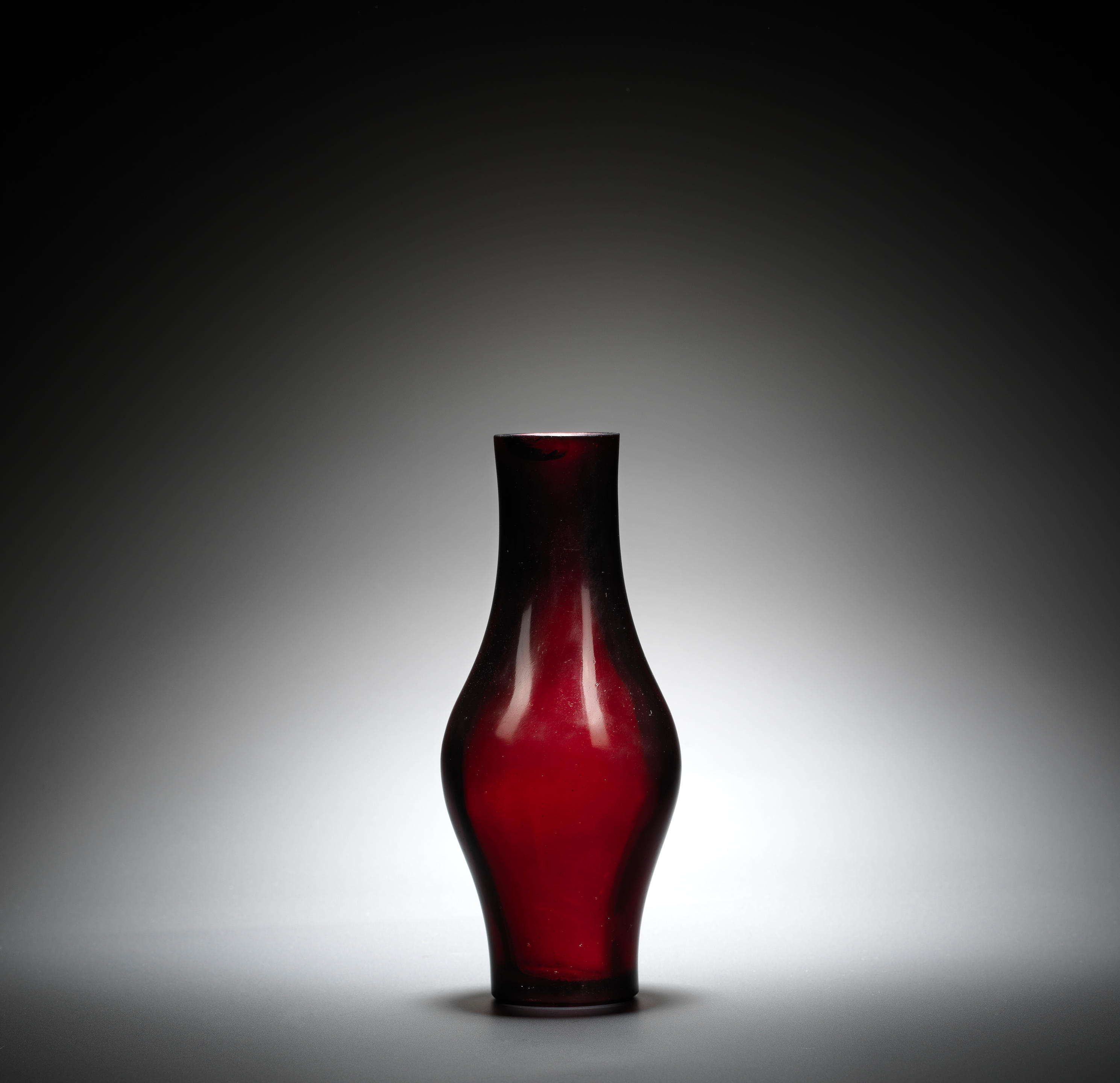 Bonhams An Imperial Ruby Red Glass Spindle Vase Qianlong Wheel Cut