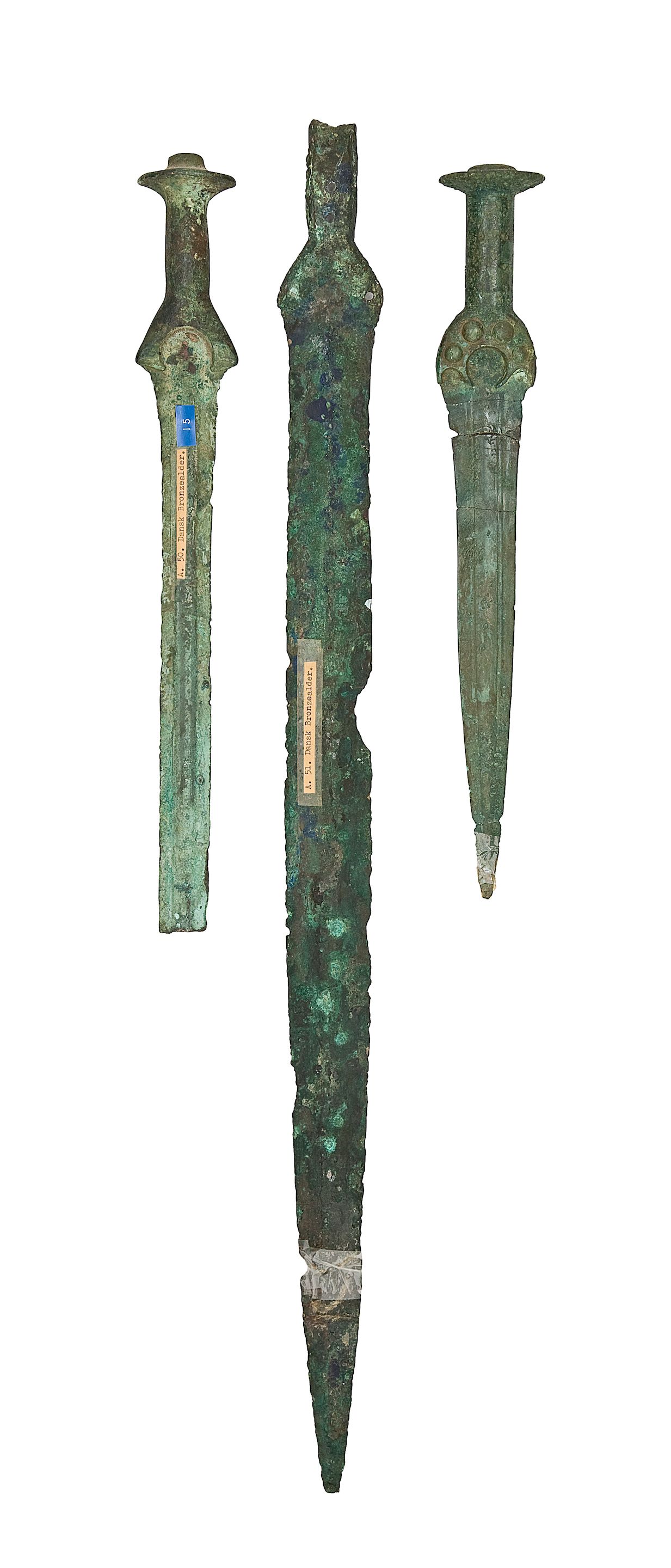 Two North European Bronze Daggers, And A North European Bronze Sword ...