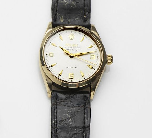 Bonhams : Rolex. A 9ct gold automatic centre seconds wristwatchAir King ...