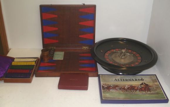 Bonhams : A vintage roulette wheel, cloth, case of gaming chips, ball ...