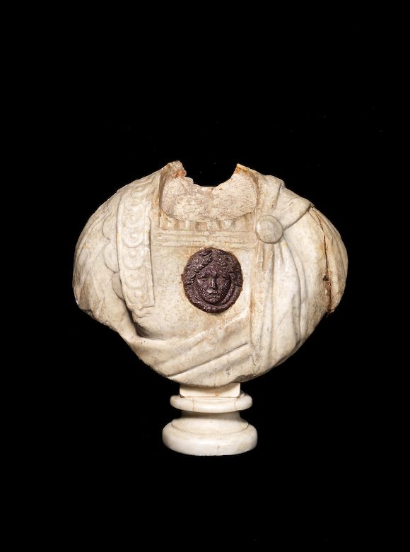 Bonhams : An Italian 17th century white marble and red porphyry bust