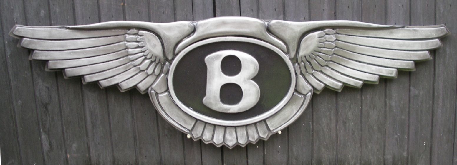 Bonhams Cars : A Bentley 'winged B' garage display emblem,