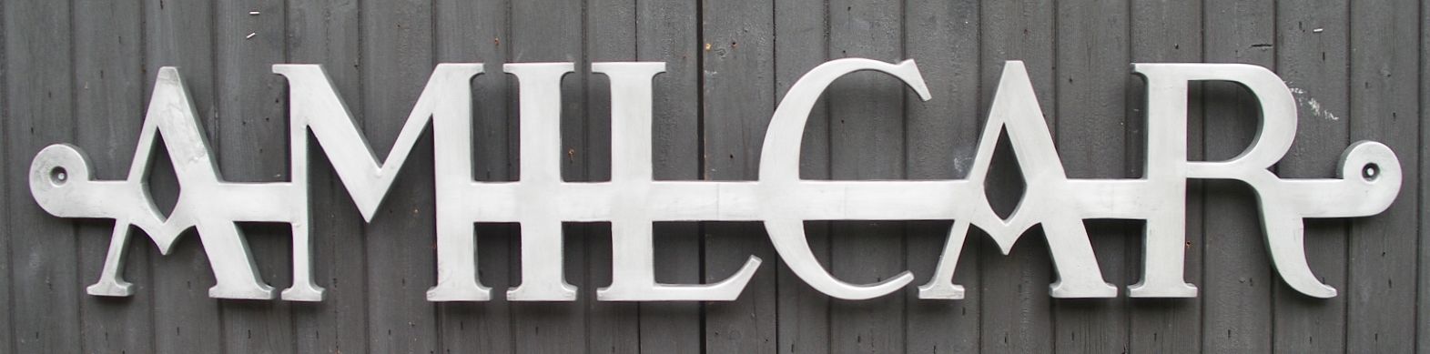 Bonhams Cars : An 'Amilcar' garage display emblem,