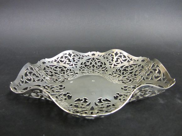 Bonhams : A silver circular pierced dish by the Royal Irish Company ...