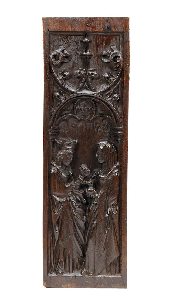 Bonhams : A good carved oak pew-end Probably late 15th/early 16th century