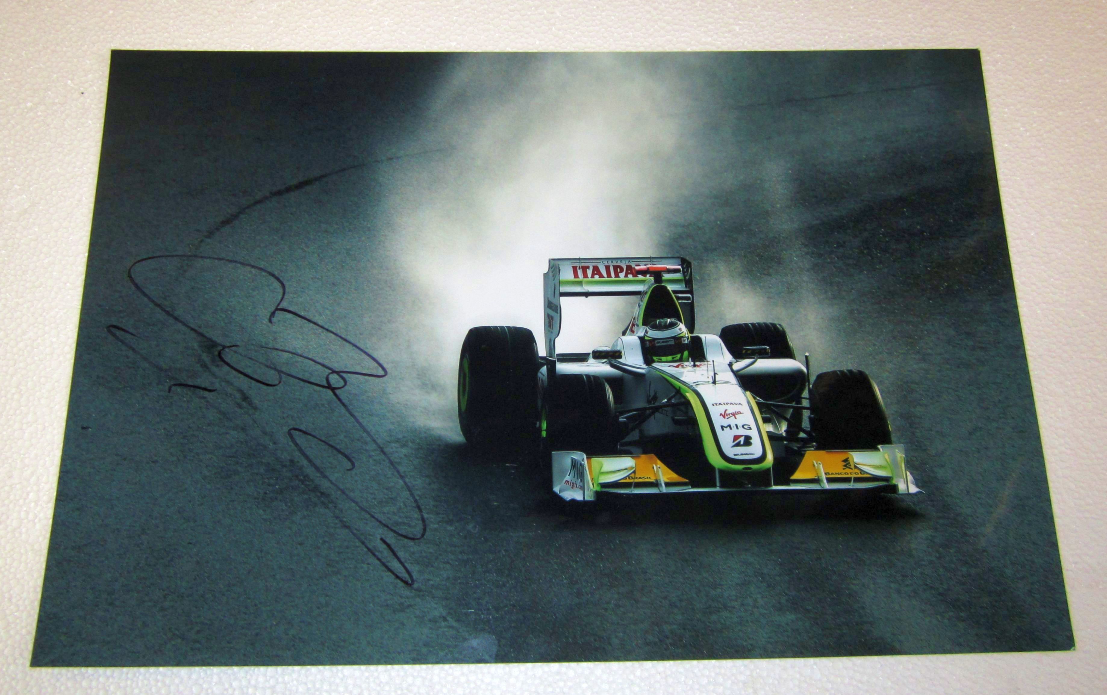 Bonhams Cars : A Jenson Button signed print.