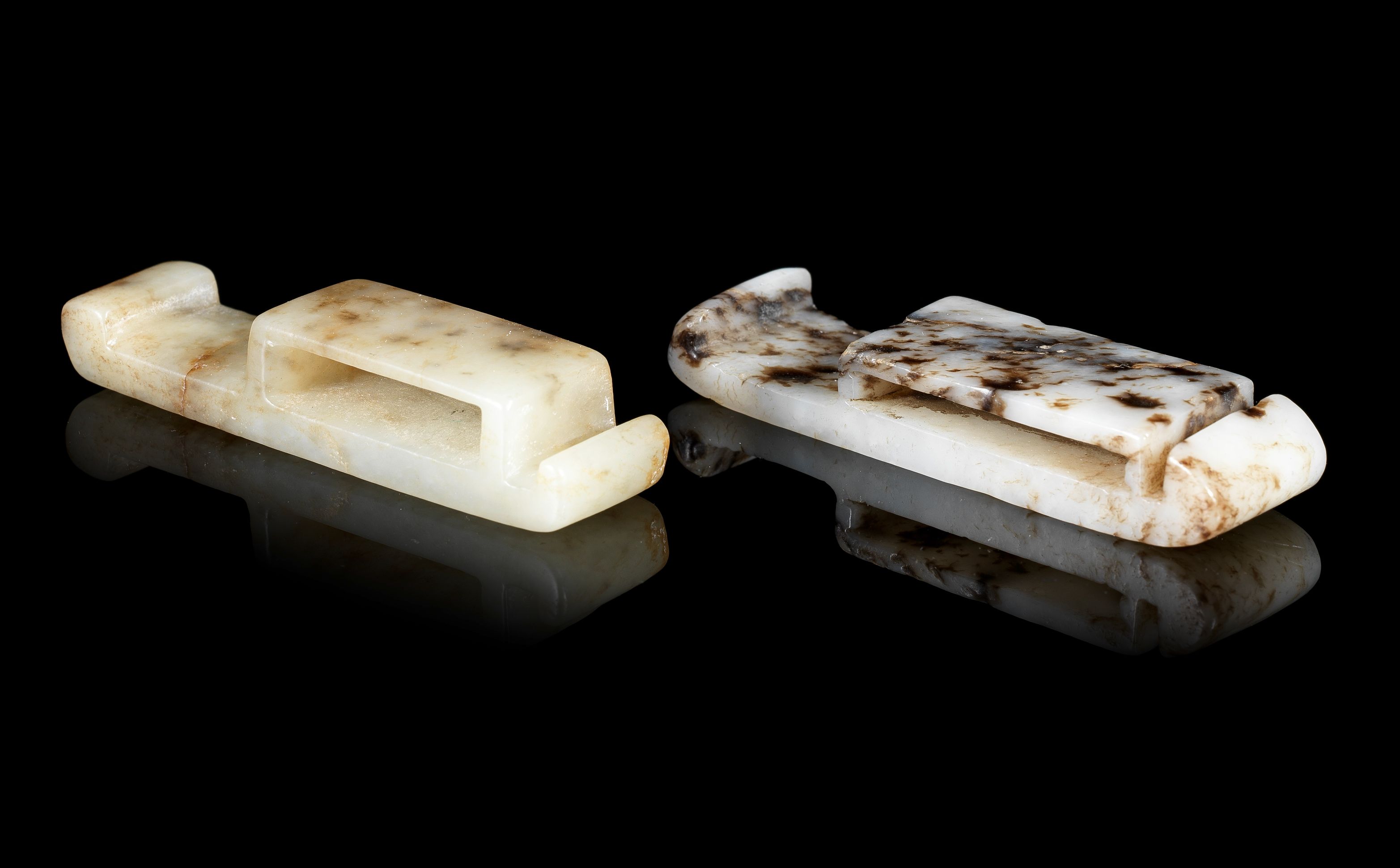 Bonhams : Two jade sword slides