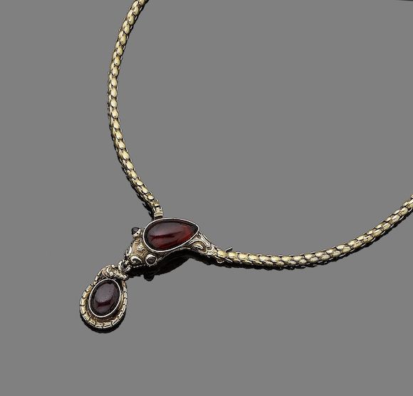 Bonhams : A gold and garnet serpent necklace