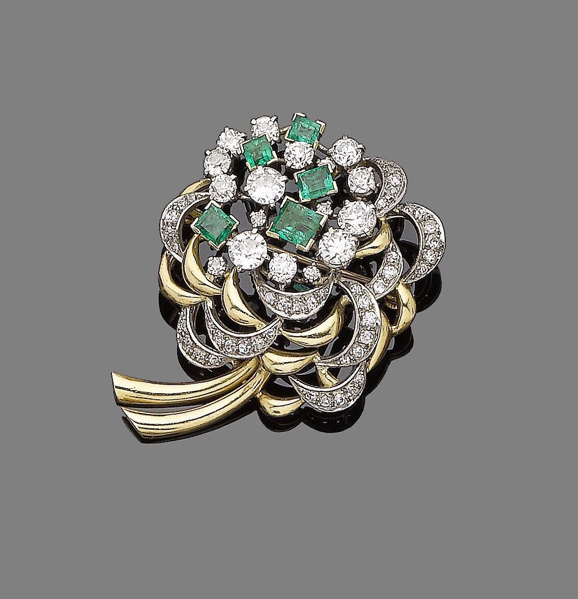 Bonhams : An emerald and diamond brooch