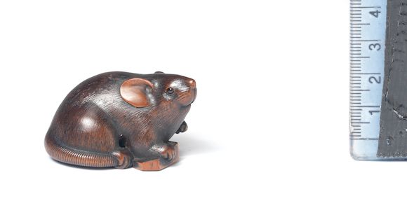 Bonhams : A wood netsuke of a rat By Ikkan, Nagoya, 19th century