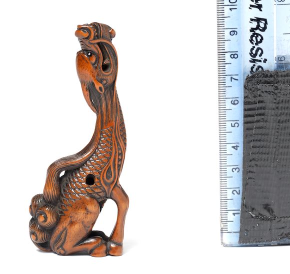Bonhams : A fine wood netsuke of a kirin Kyoto, late 18th century