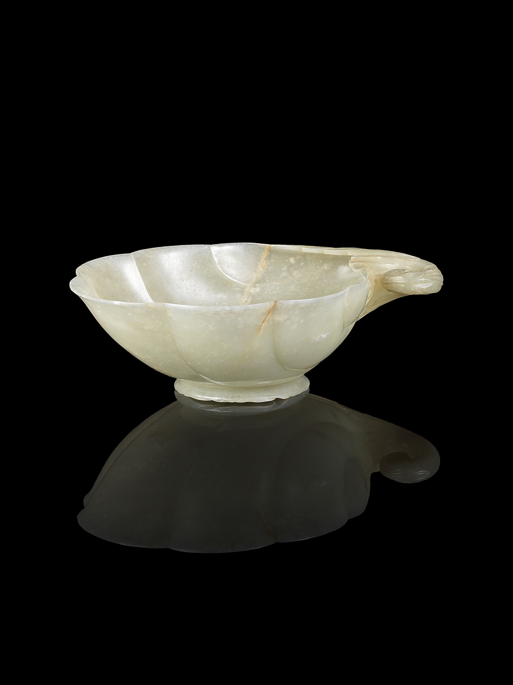 Bonhams : A fine Mughal-style pale green jade shell-shaped cup 18th century
