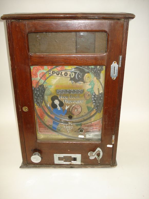 Bonhams : An Oliver Whales 'Fruit Polo' win wall machine,