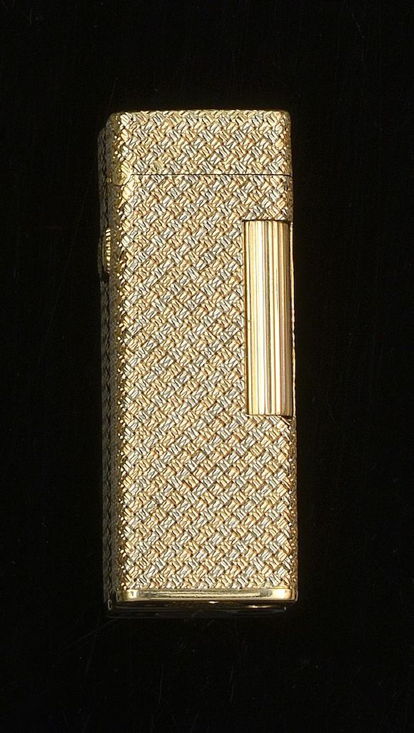Bonhams : Dunhill: A two colour precious yellow metal rectangular lighter