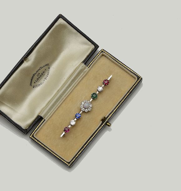 Bonhams : A diamond and vari gem-set bar brooch