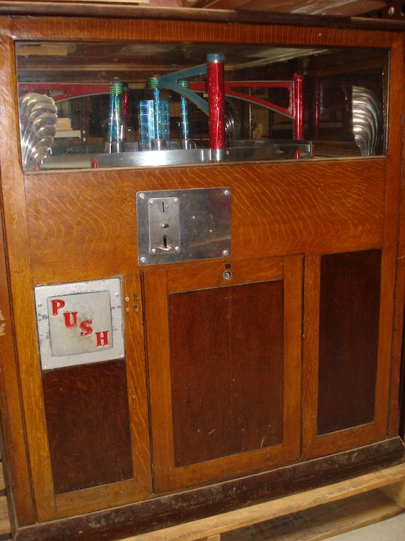Bonhams : A large four-player prize-pusher coin-operated console, circa ...