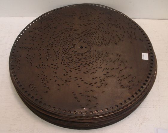 Bonhams : A collection of 24 Polyphon discs, 40cm diameter,