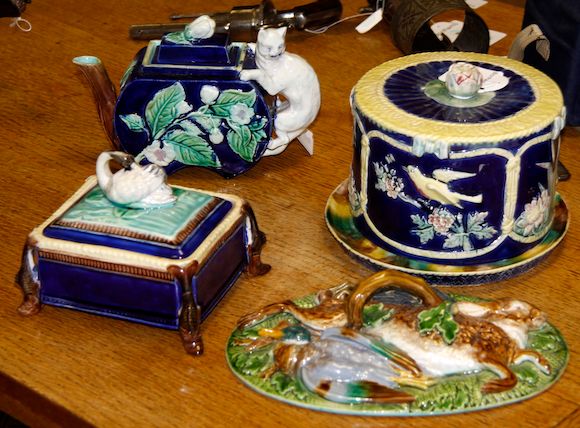 Bonhams : An English majolica cheese dome and stand, a teapot and cover ...