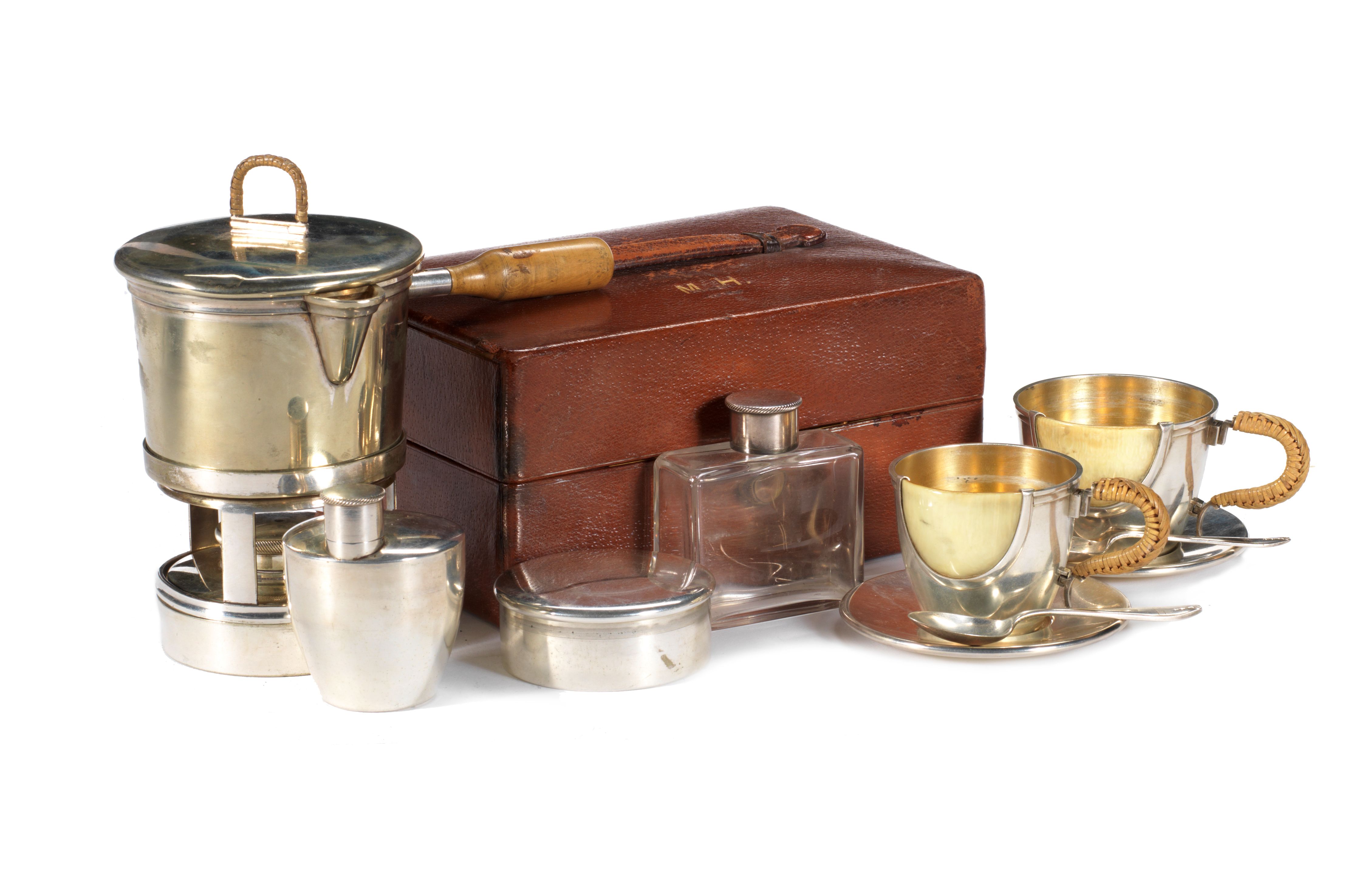 Bonhams Cars : A fine and rare leather-cased two-person tea set, by ...