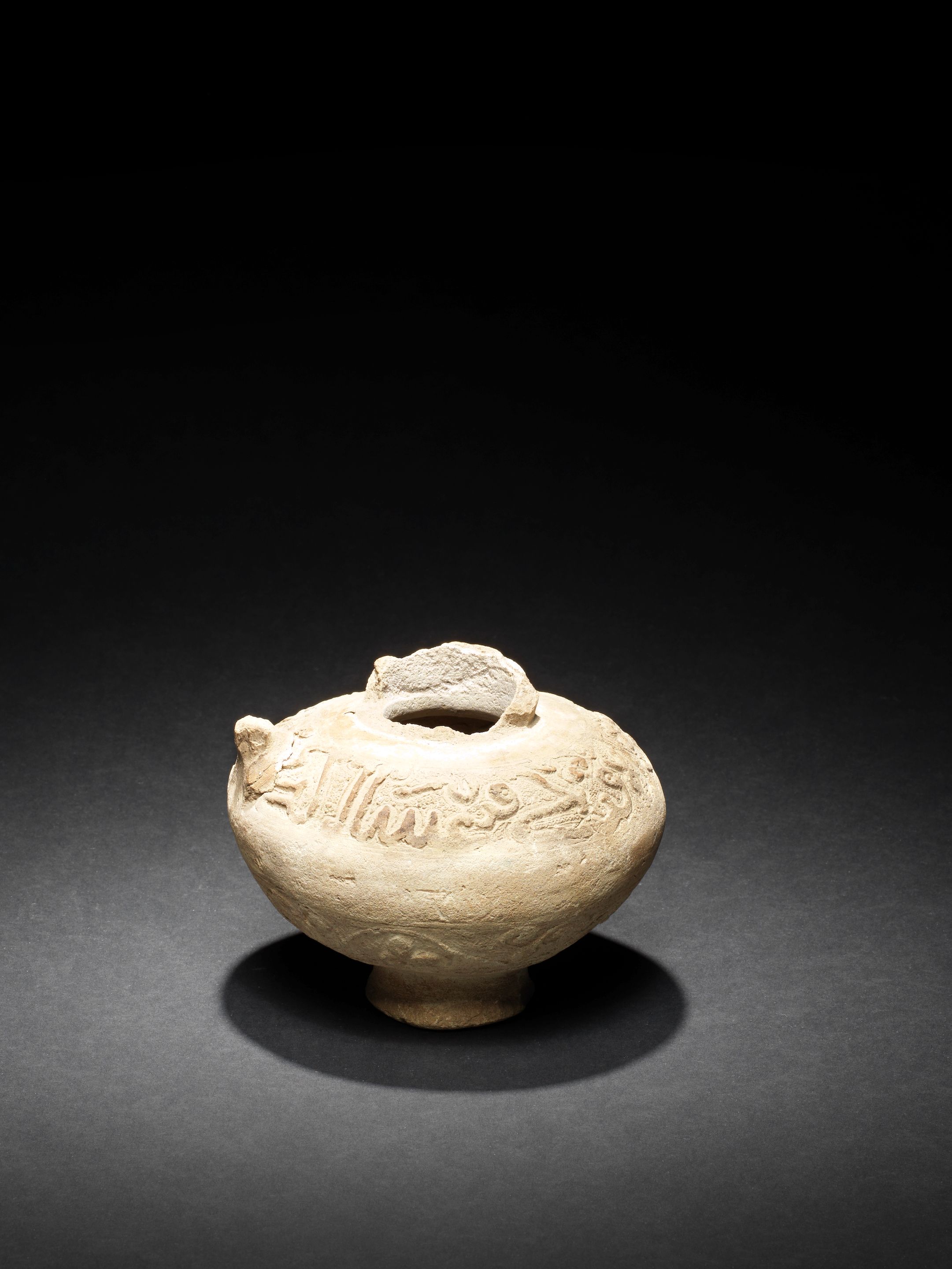 Bonhams : A fragmentary unglazed pottery Vessel Persia, 12th/ 13th Century