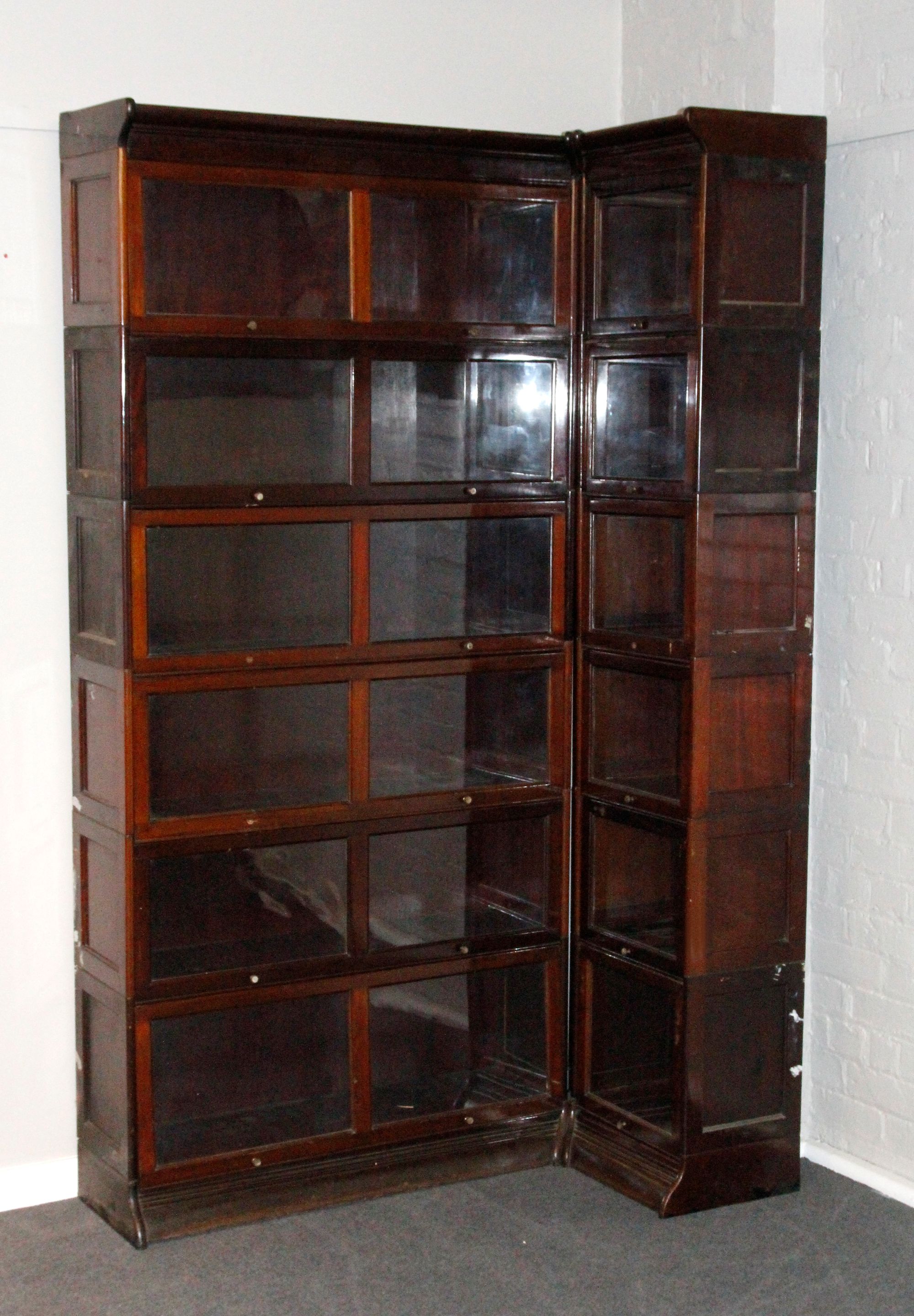 Bonhams : A Globe Wernicke-style mahogany stacking corner bookcase