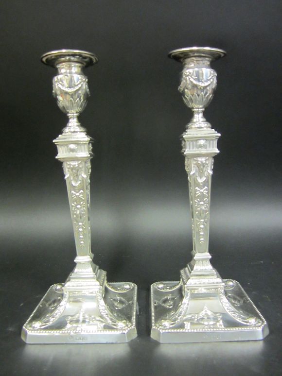 Bonhams : An Edwardian pair of silver candlesticks by William Hutton ...