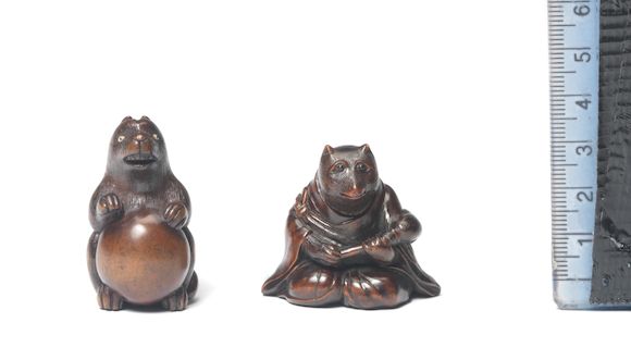 Bonhams : Two wood netsuke of tanuki The first by Maskazu, the second ...