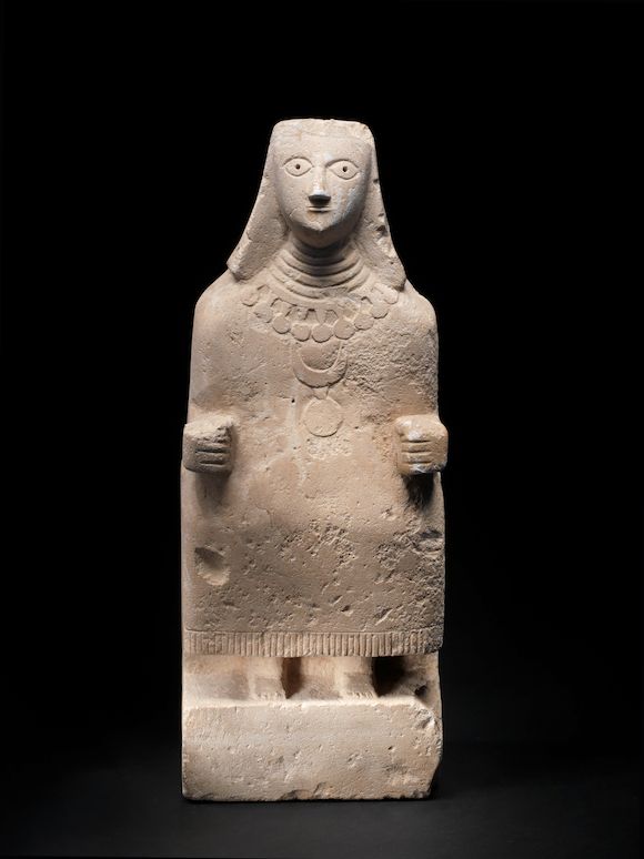 Bonhams : A South Arabian limestone seated figure