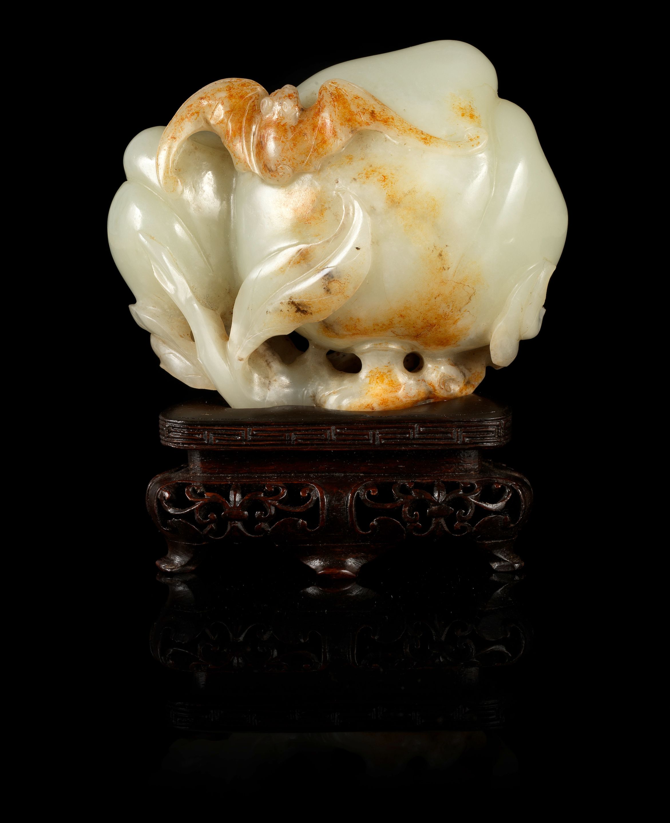Bonhams : A reticulated jade carving of peaches 17th or 18th century