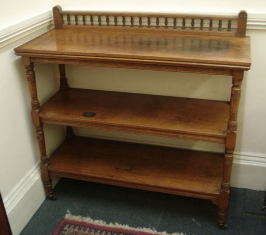 Bonhams : An Edwardian oak three tier buffet, with low raised spindle ...