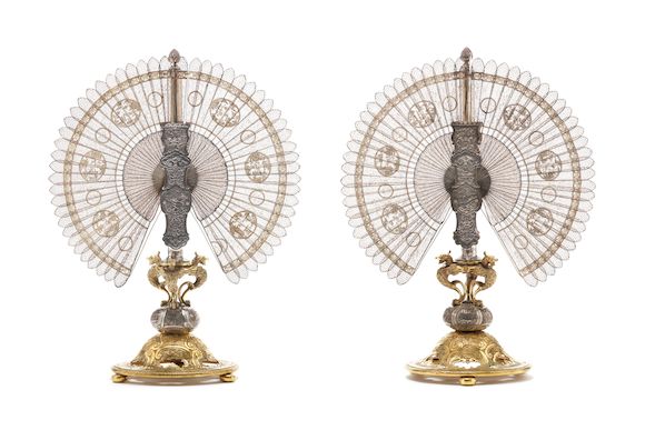 Bonhams : A fine and rare pair of silver filigree cockade fans and ...