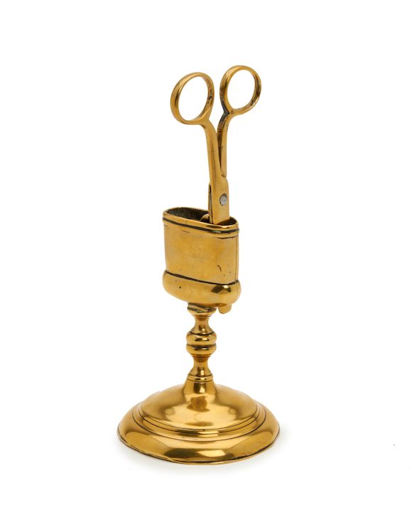 Bonhams : An early 18th century pair of brass snuffers in a pedestal ...