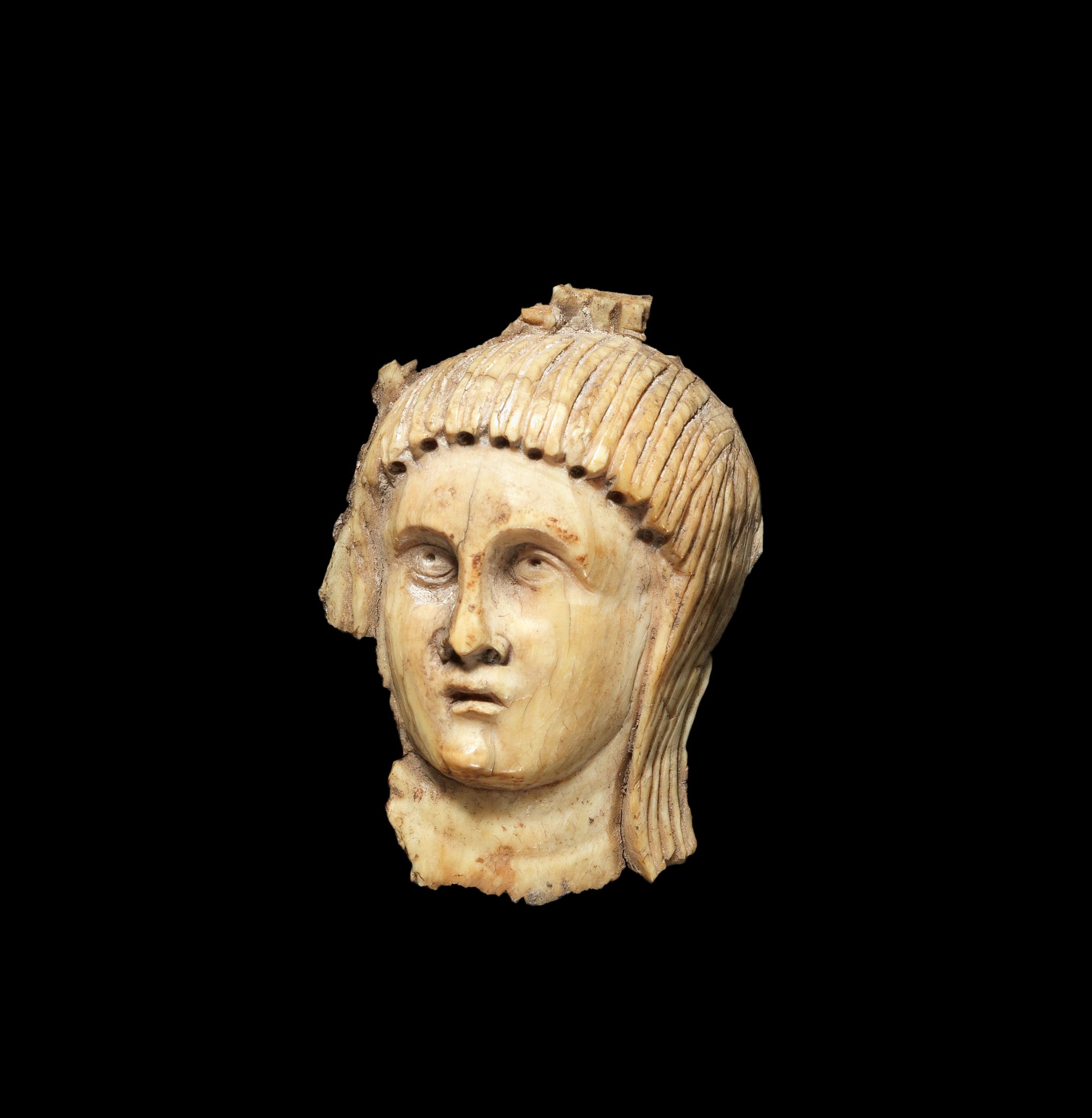Bonhams : A Byzantine ivory male head inlay